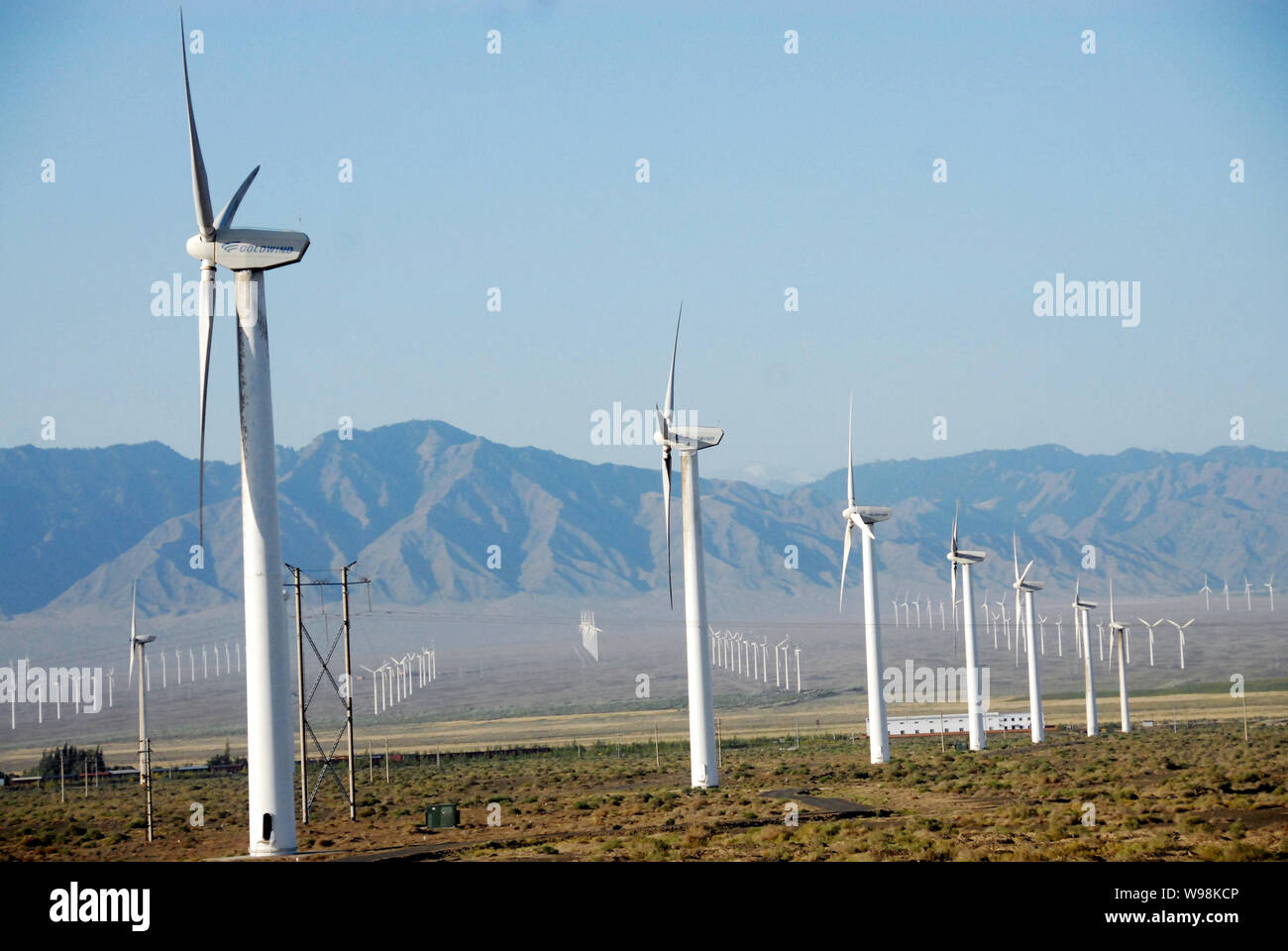 --FILE--Wind turbines generate electricity at a wind farm in Dabancheng ...