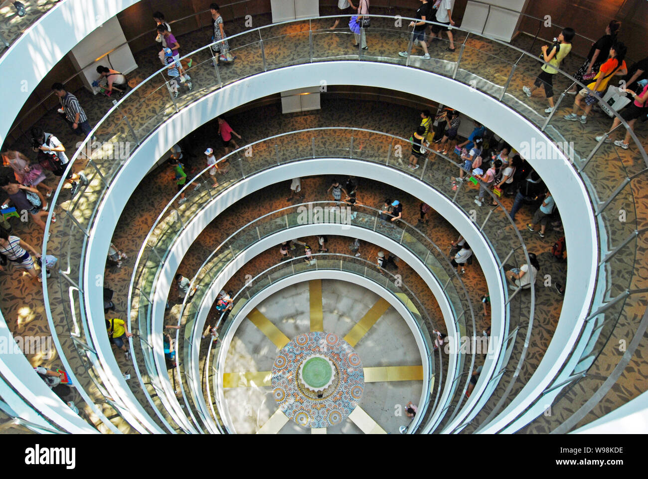 --FILE--Visitors walk down the winding slope in the Saudi Arabia ...