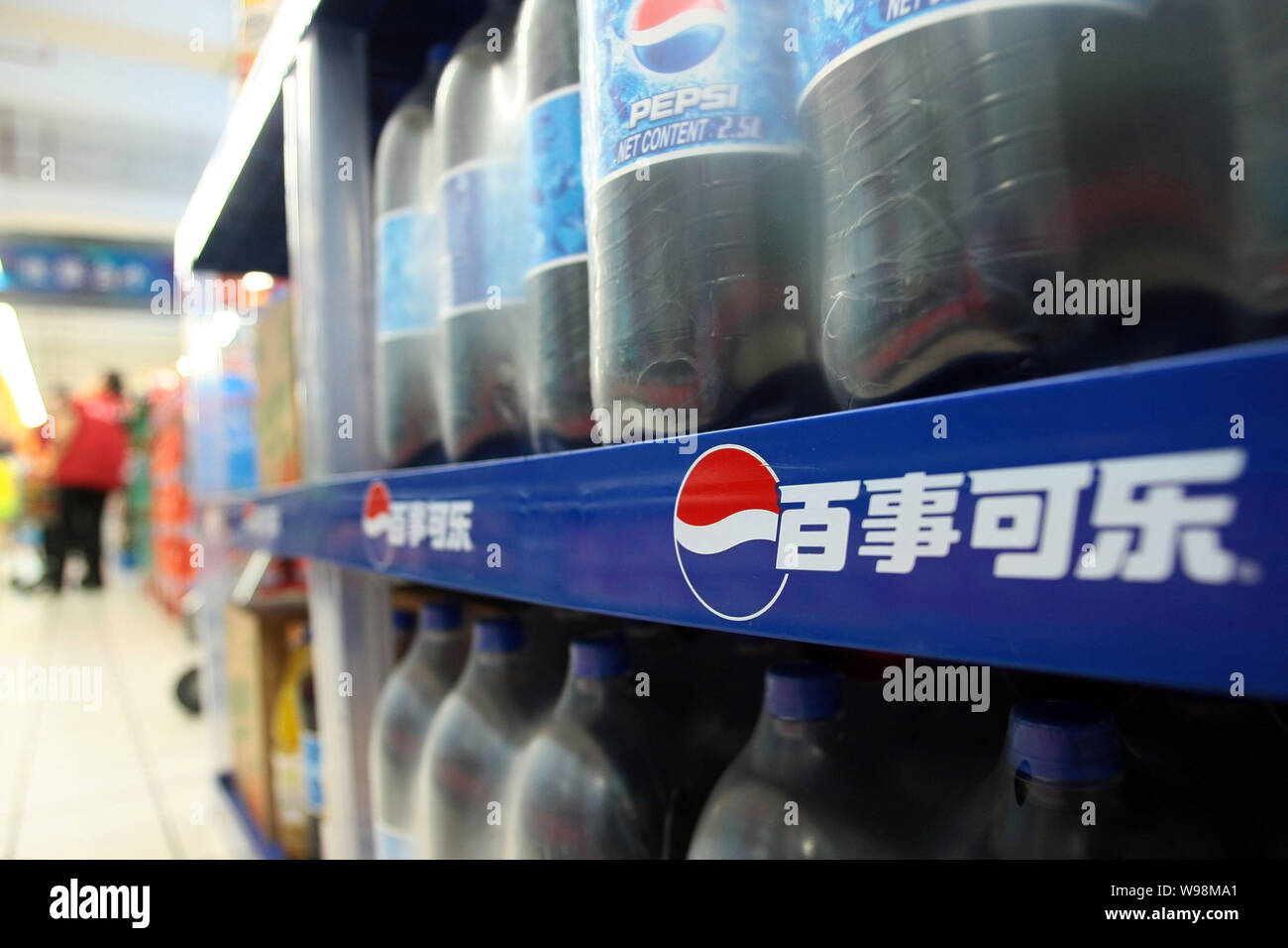 Bottles of Pepsi-Cola of PepsiCo Inc. are seen in a supermarket in ...
