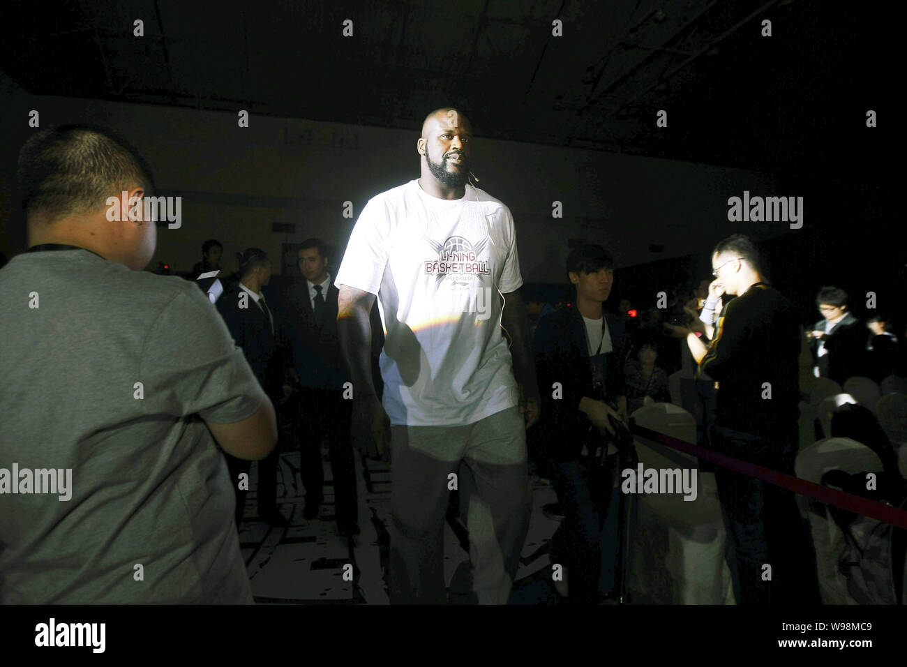 Retired NBA star Shaquille ONeal, center, attends a promotional event ...