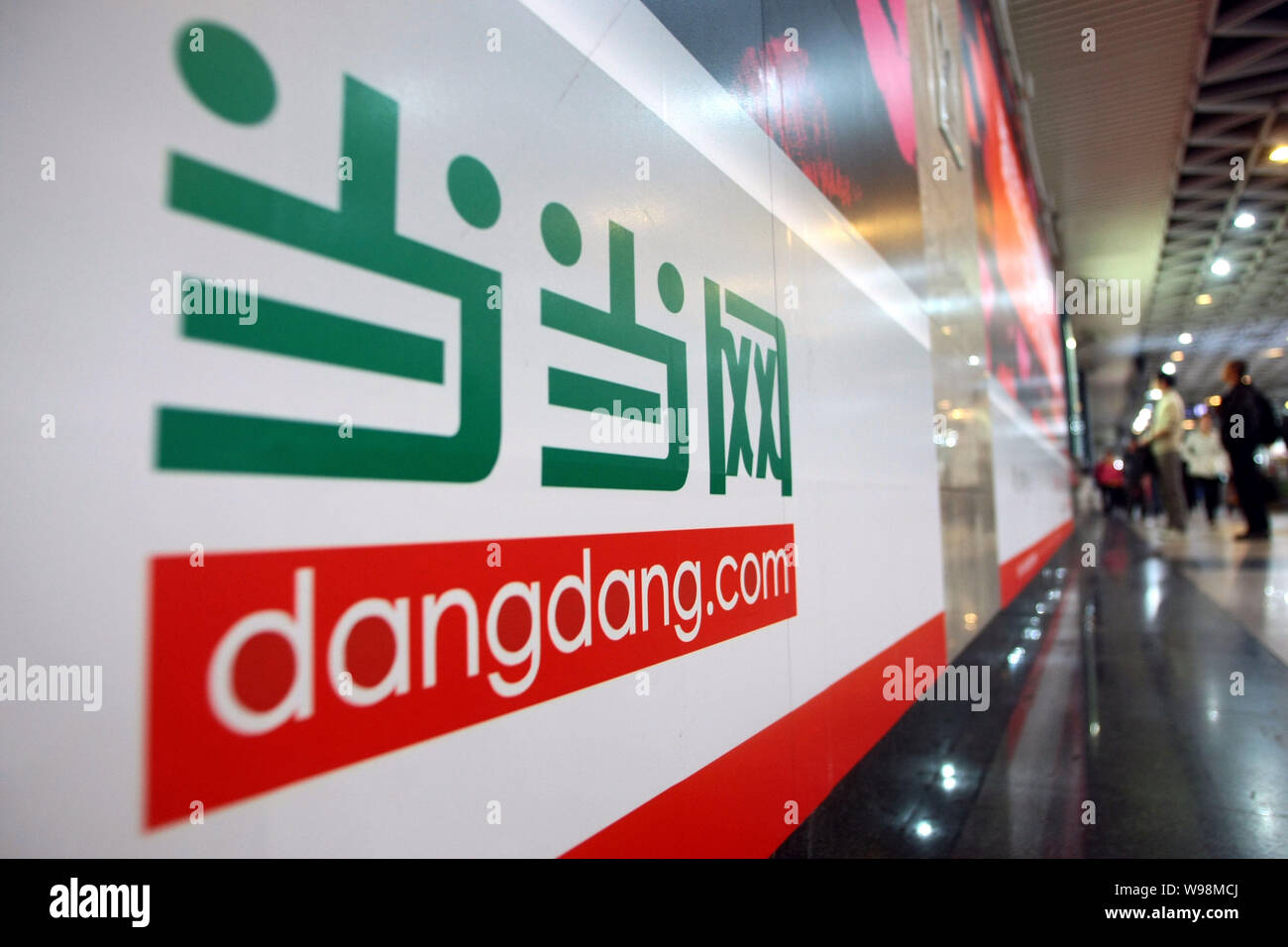 An advertisement for online shopping site dangdang.com is pictured at a ...