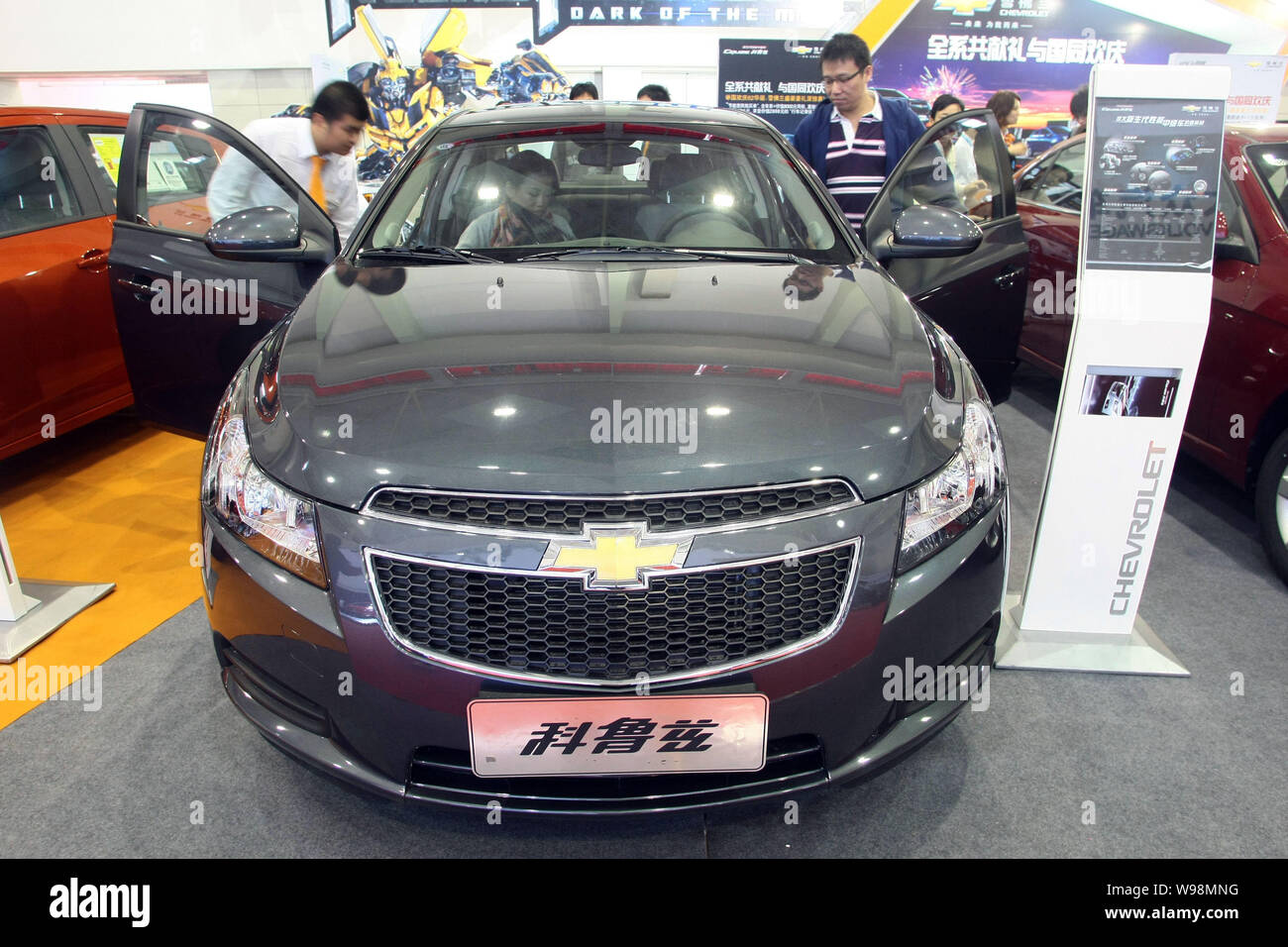 --File--Customers try out a Chevy Cruze car, manufactured by Shanghai ...