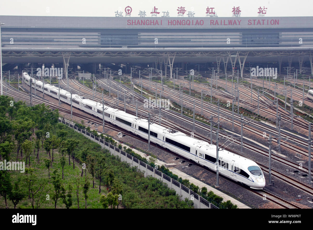 A CRH (China Railway High-speed) train departs from Hongqiao Railway ...