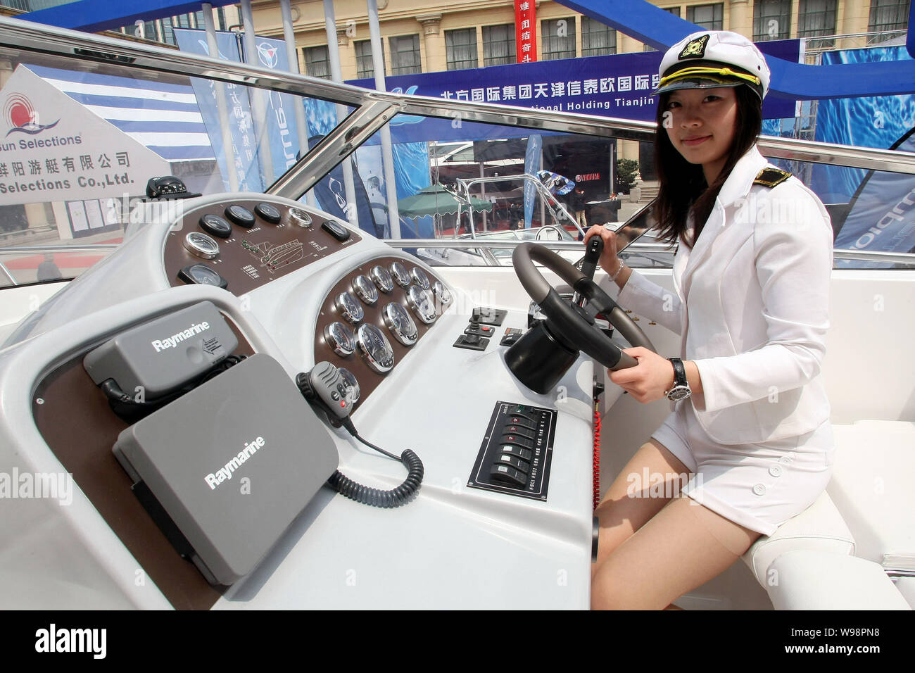 A model poses on a luxury yacht during the 2011 China (Shanghai ...