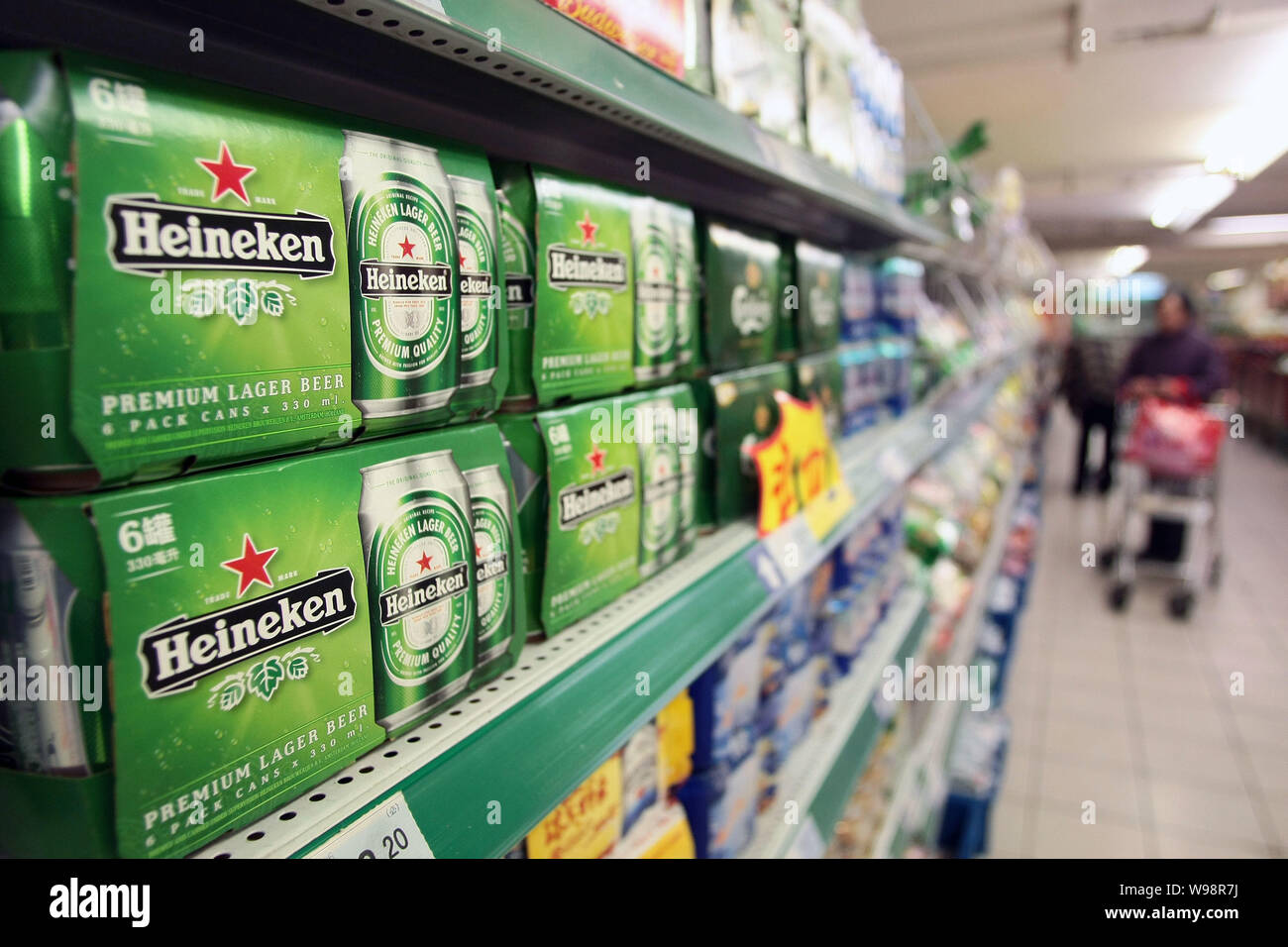 --File--Cans of Heineken are for sale at a supermarket in Shanghai ...