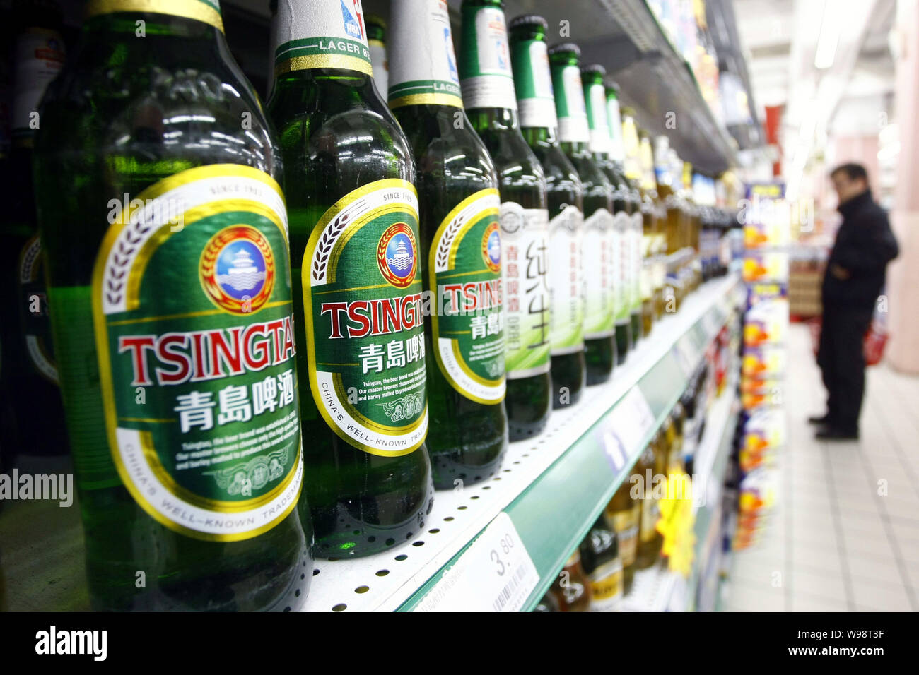 --FILE--Bottles of Tsingtao Beer are for sale at a supermarket in ...