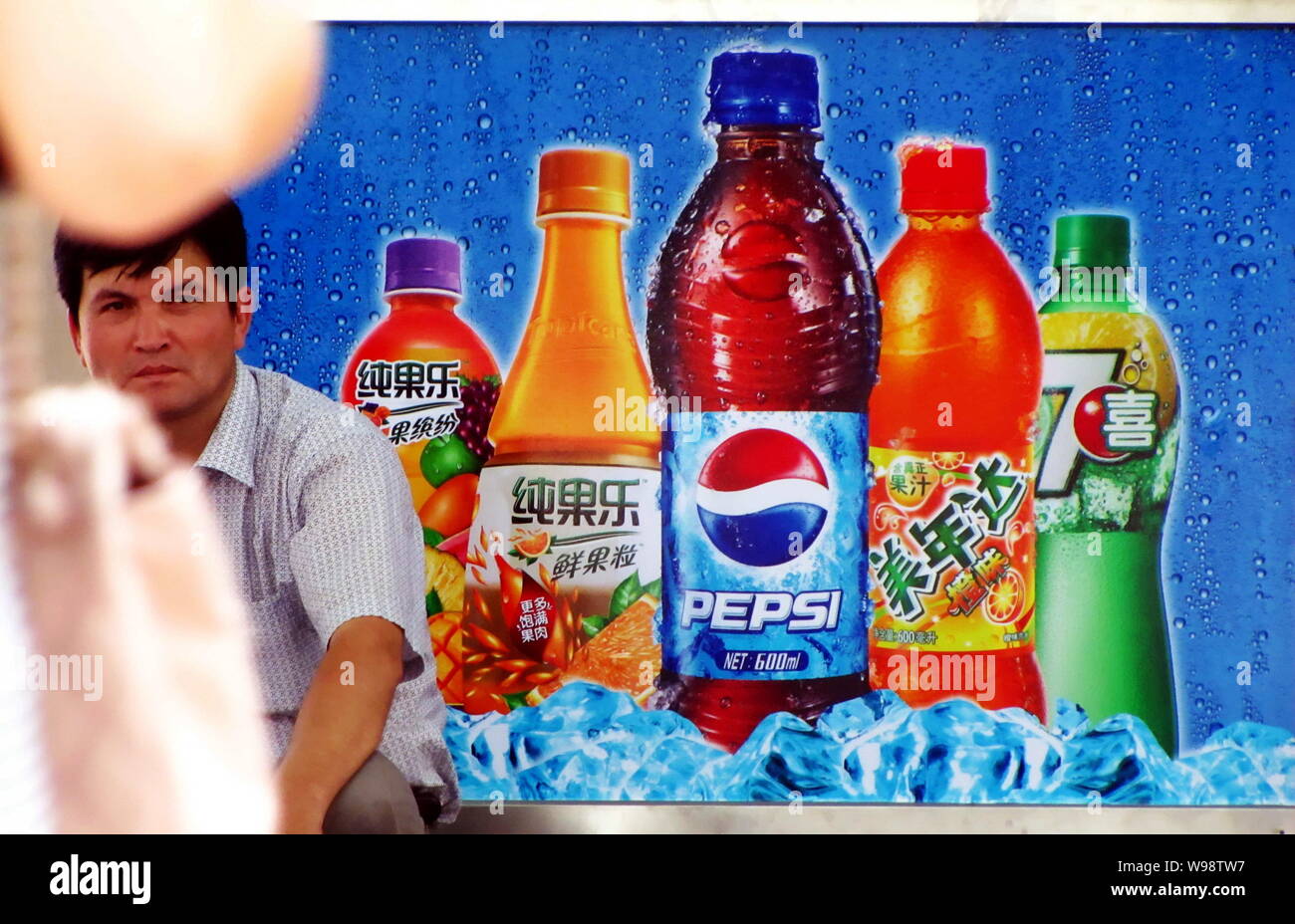 --File--View of an advertisement for Pepsi Coke in Shanghai, China, 30 ...