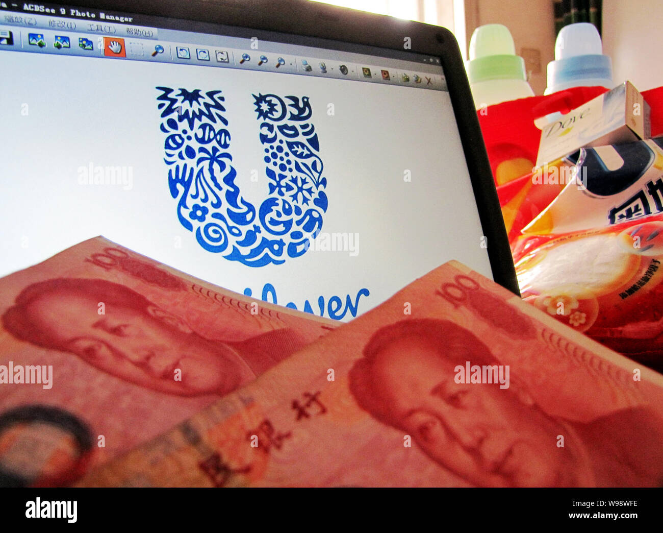 --FILE--A Unilever logo is seen on a computer screen as well as hundred ...