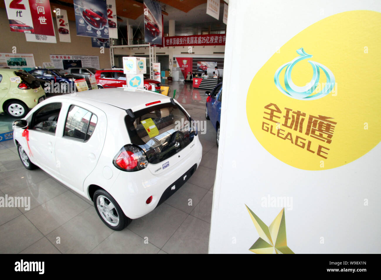 --FILE--Gleagle and other Geely cars are seen on display at a Geely ...