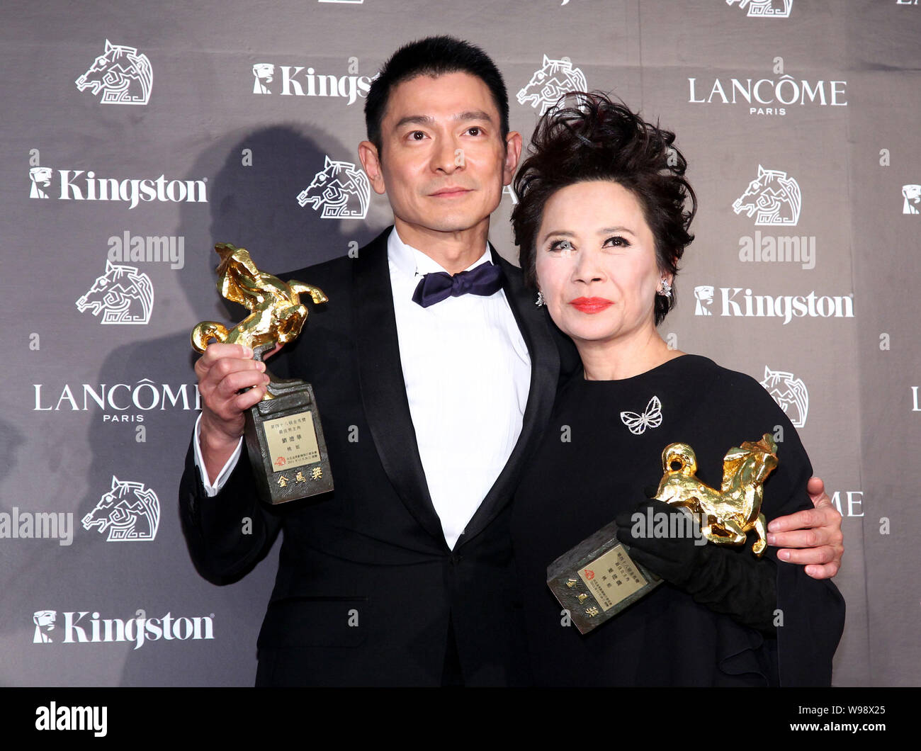 Hong Kong singer and actor Andy Lau and Hong Kong actress Deannie Yip ...
