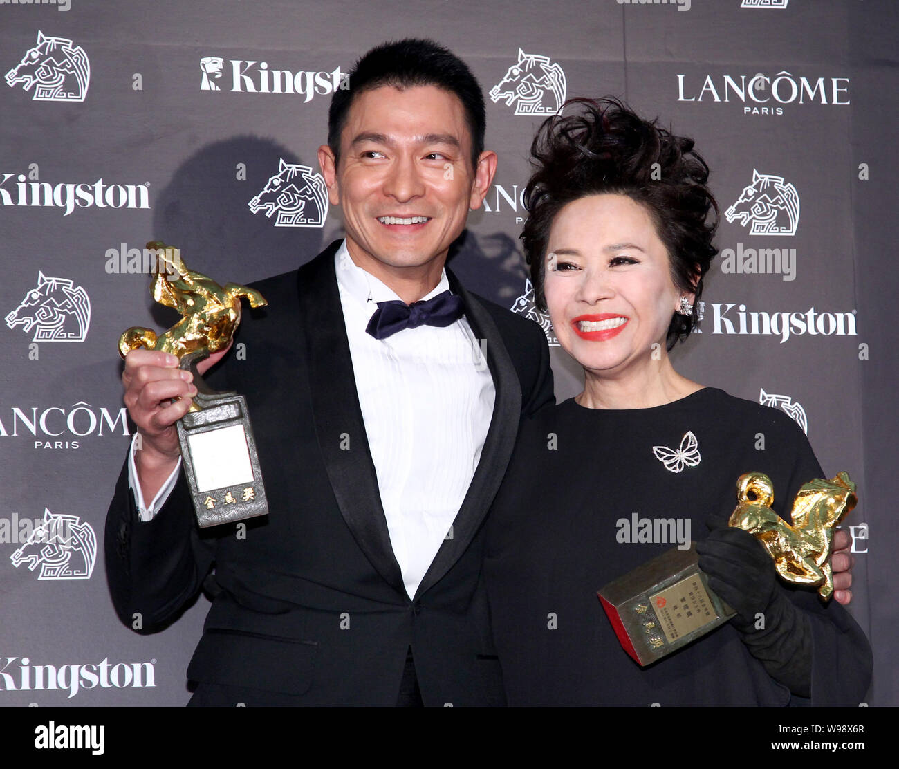 Hong Kong singer and actor Andy Lau and Hong Kong actress Deannie Yip ...