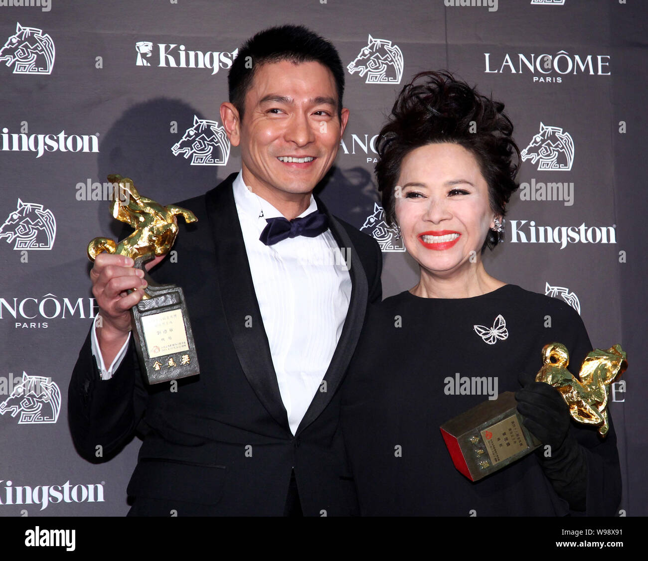 Hong Kong singer and actor Andy Lau and Hong Kong actress Deannie Yip ...