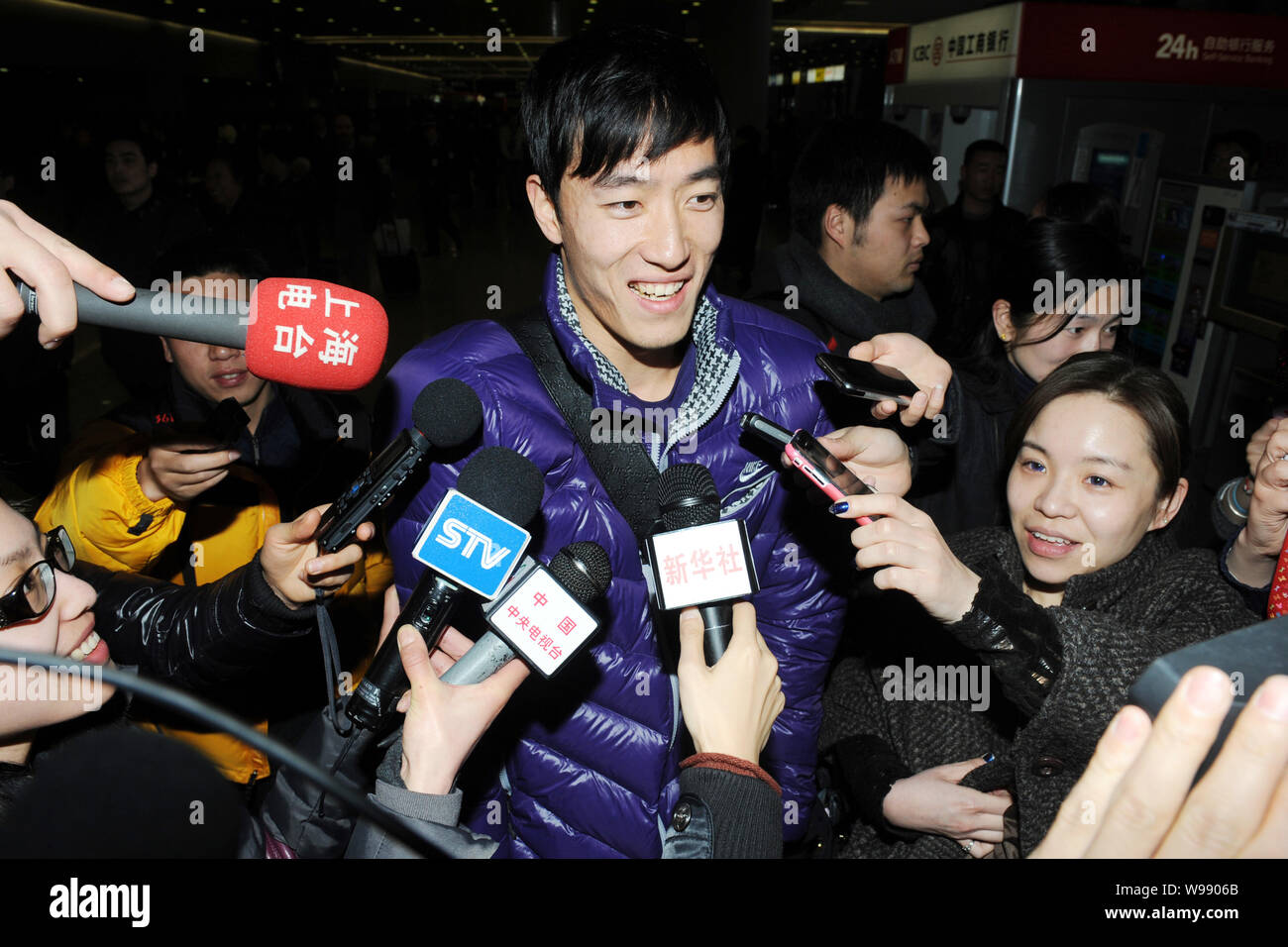 Chinese star hurdler Liu Xiang is interviewed after arriving at the ...