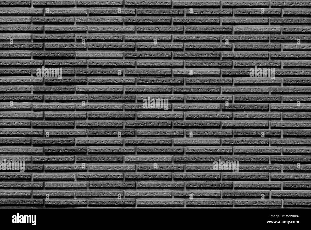 Black brick wall pattern texture for background Stock Photo - Alamy