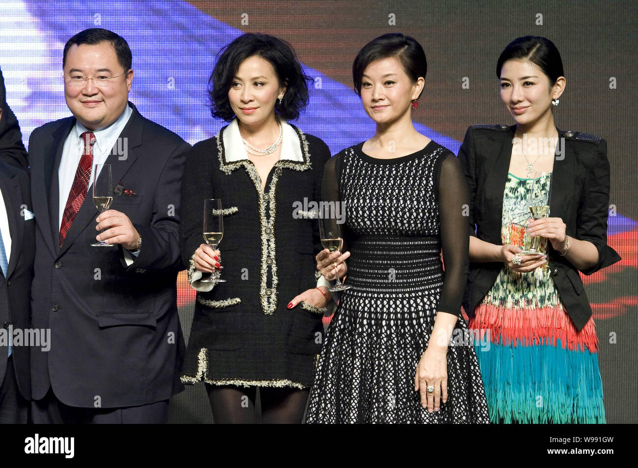 (From left) Bruno Wu, co-founder of Sun Media Investment Holdings Ltd., Hong Kong actress Carina ...