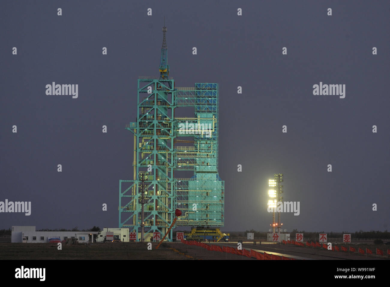 View of the Tiangong-1 spacecraft and the Long March II-F rocket before ...