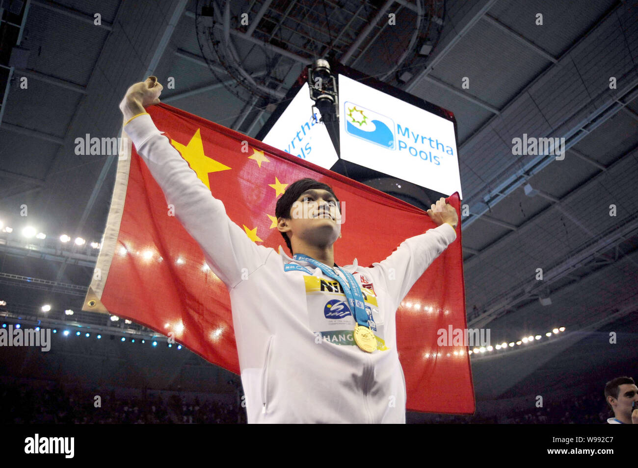 Gold medalist Sun Yang of China poses after the award ceremony for the ...