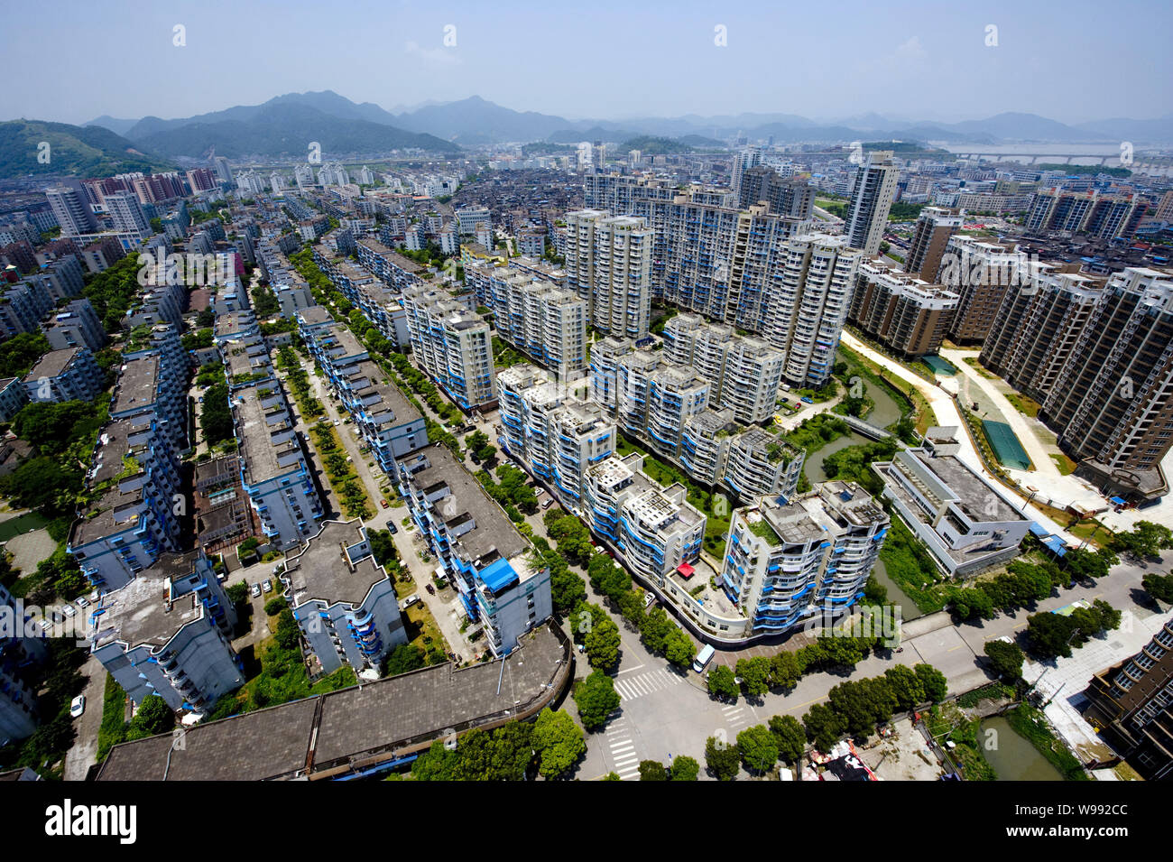 --FILE--Aerial view of clusters of old houses and new residential ...