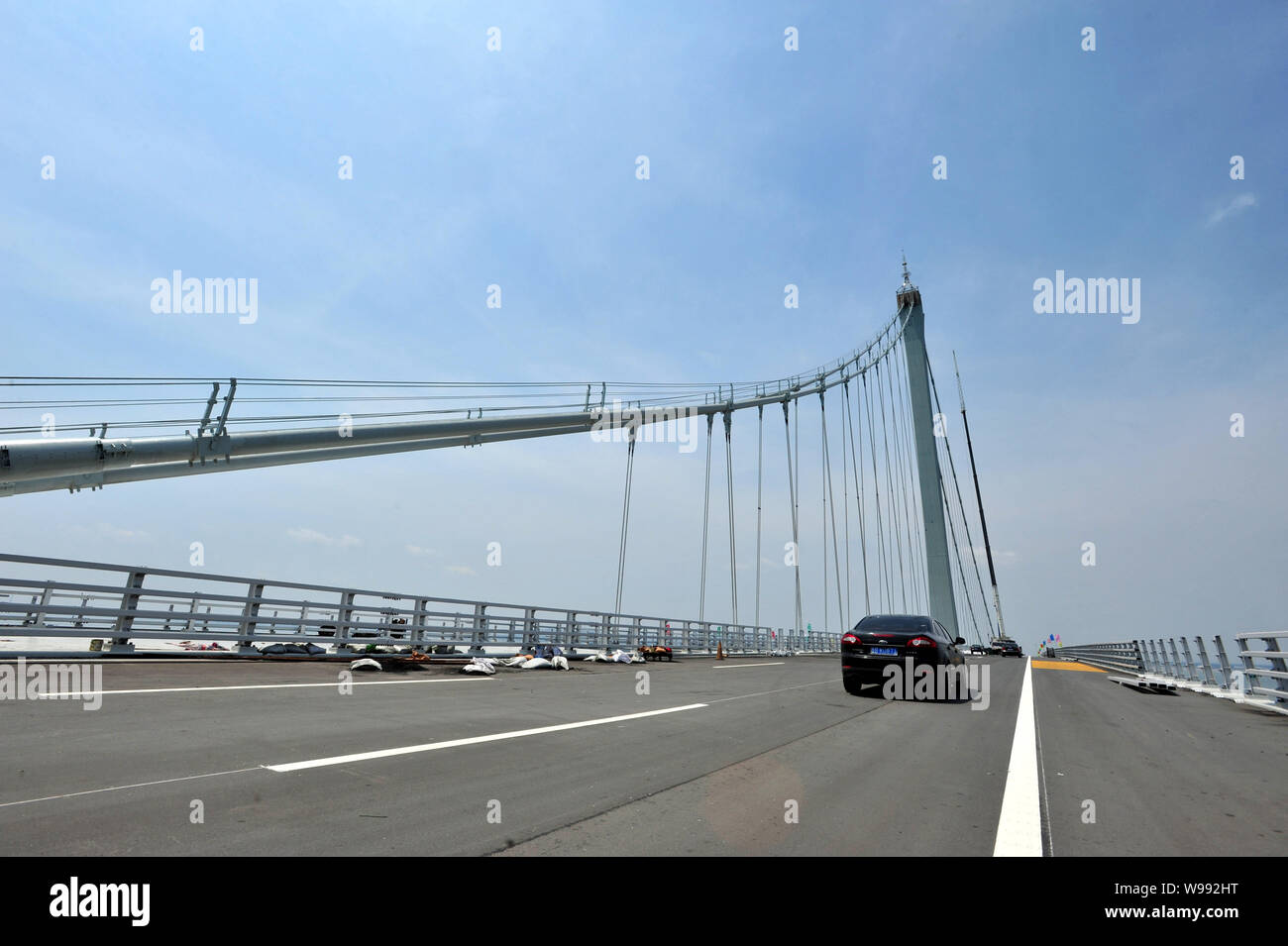 Vehicles travel on the Jiaozhou Bay Bridge, also called the Qingdao ...
