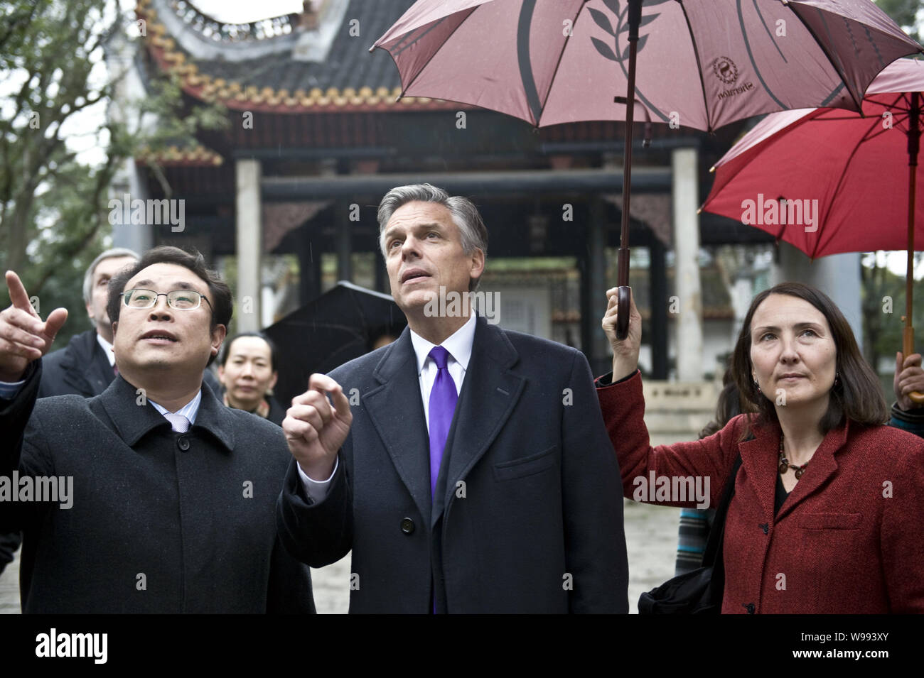 Jon Huntsman Jr. (center), Ambassador of the United States to China ...