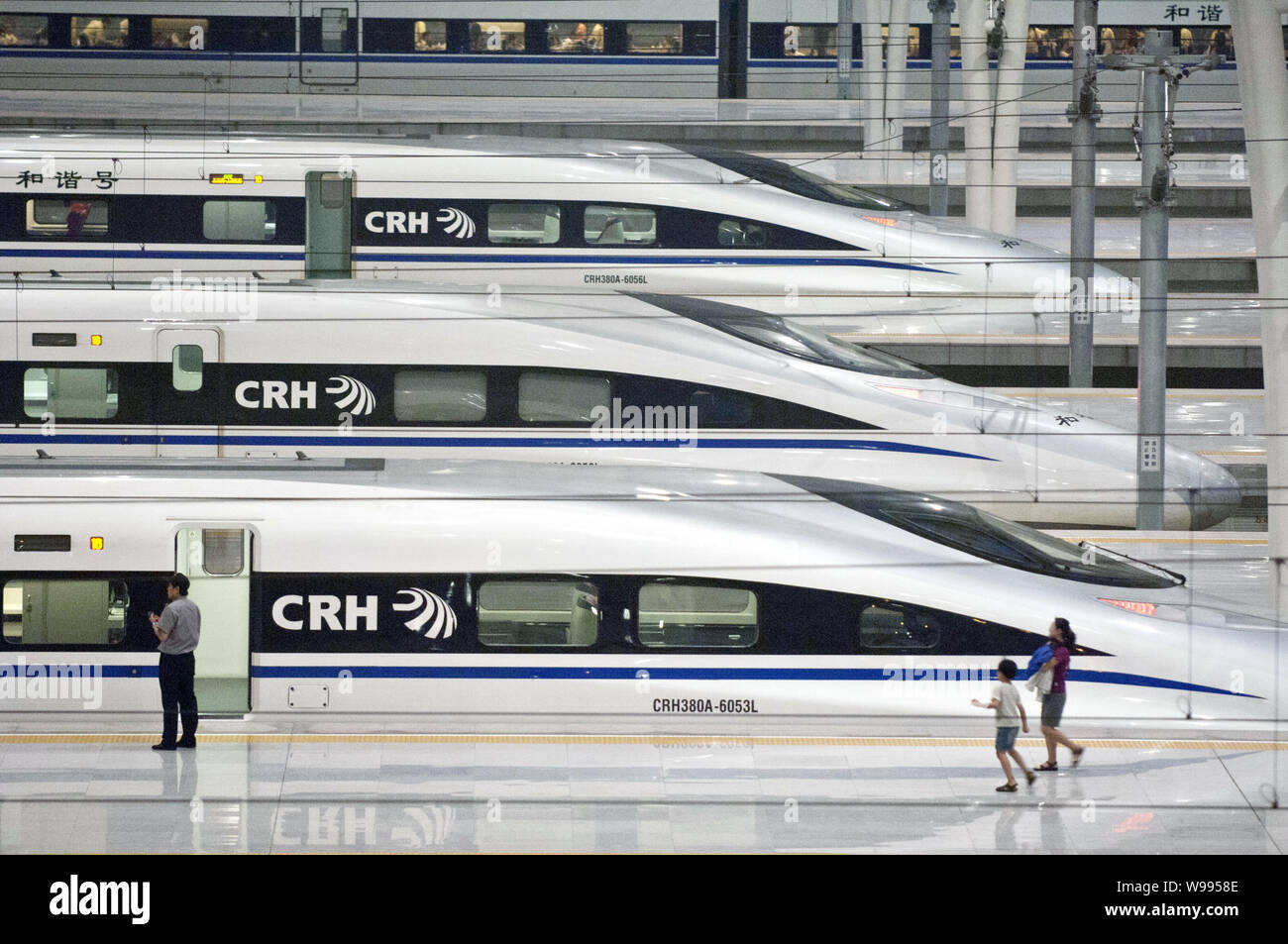 CRH380A bullet trains are pictured at the Shanghai Hongqiao Railway Station in Shanghai, China ...