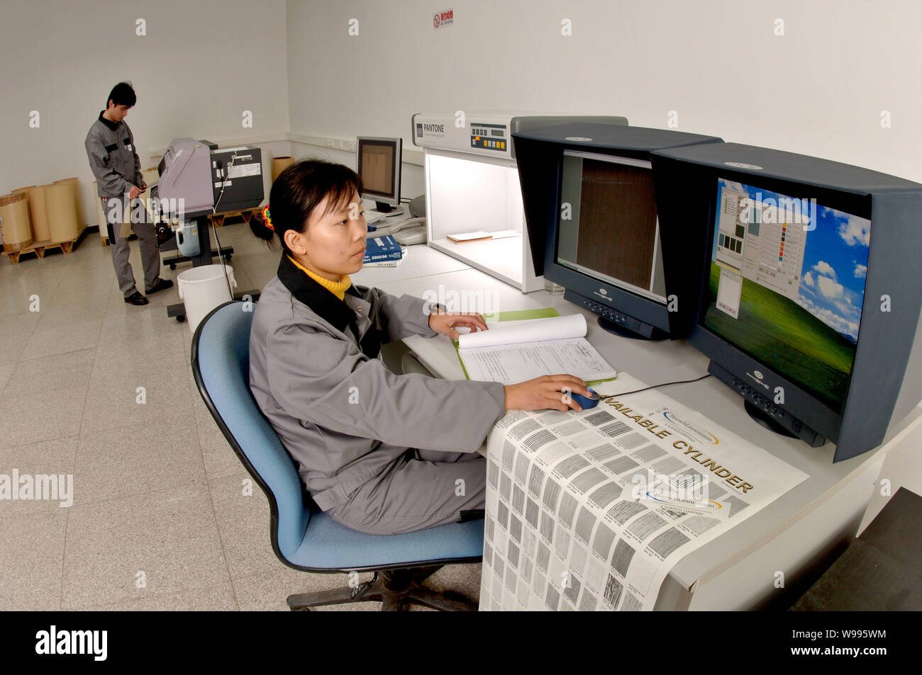 Chinese staff works on hi-res stock photography and images - Alamy