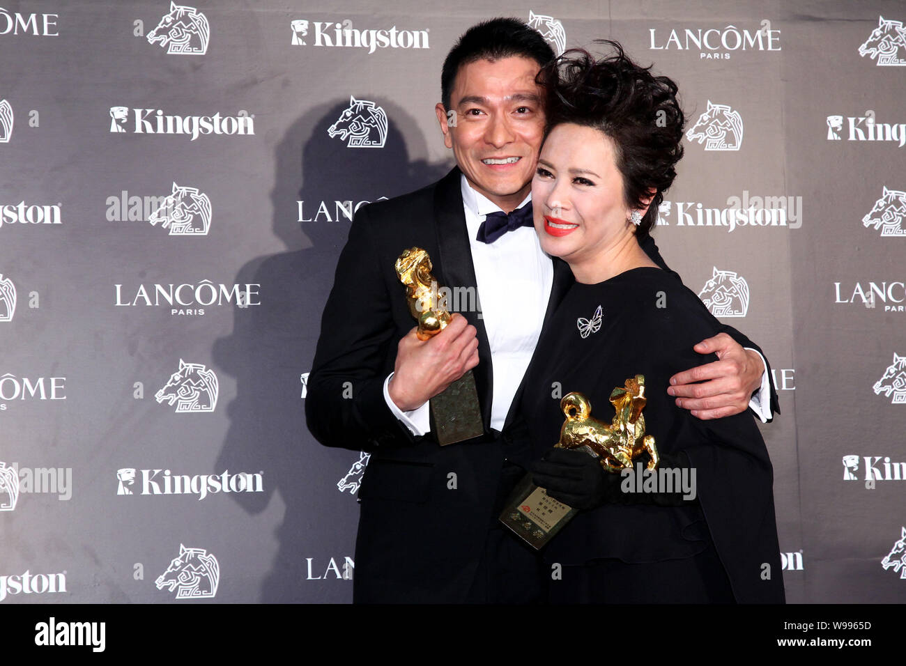 Hong Kong singer and actor Andy Lau and Hong Kong actress Deannie Yip ...