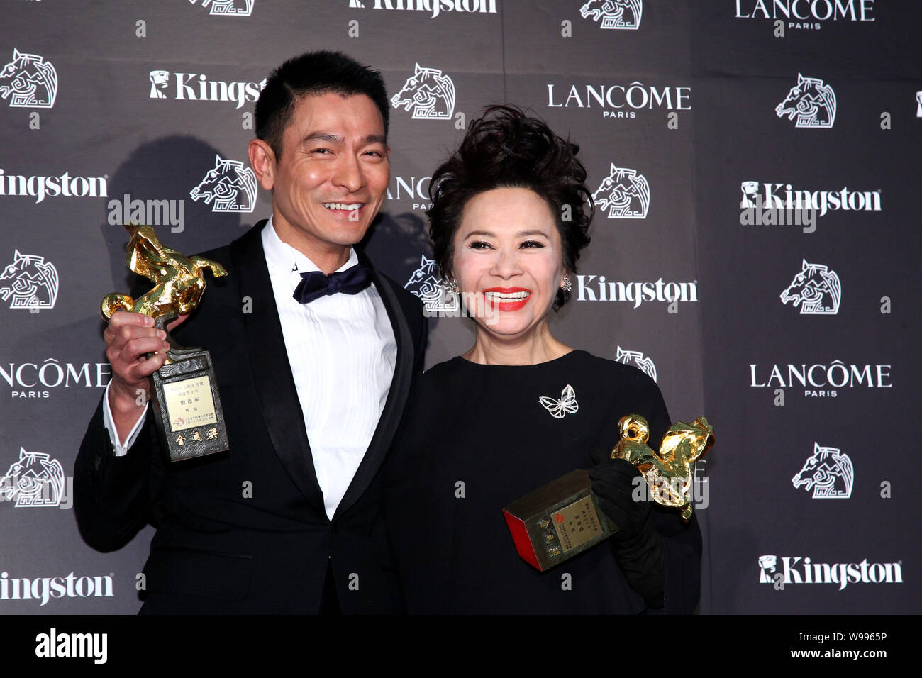 Hong Kong singer and actor Andy Lau and Hong Kong actress Deannie Yip ...