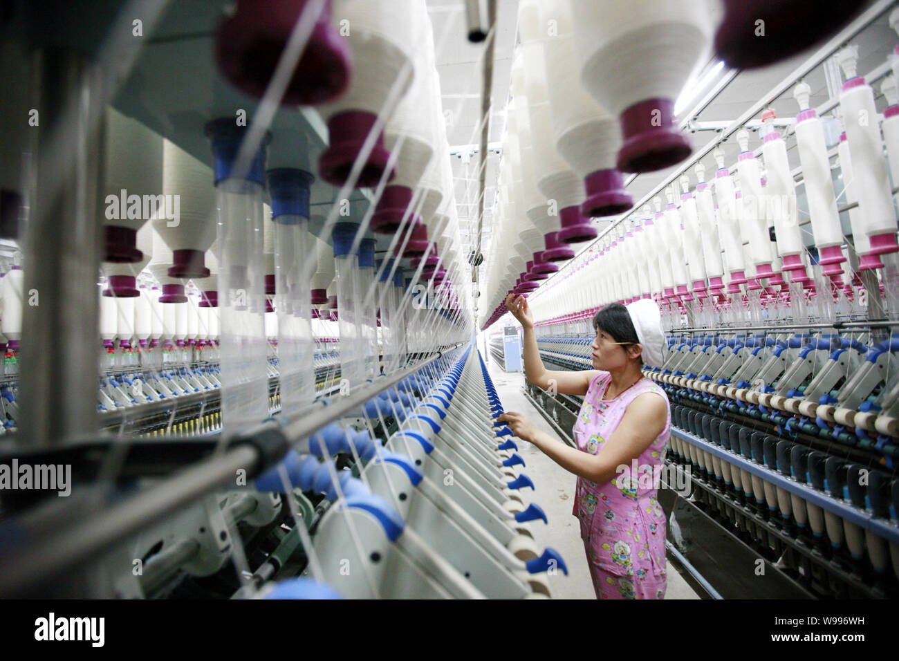 Labour intensive production hi-res stock photography and images - Alamy
