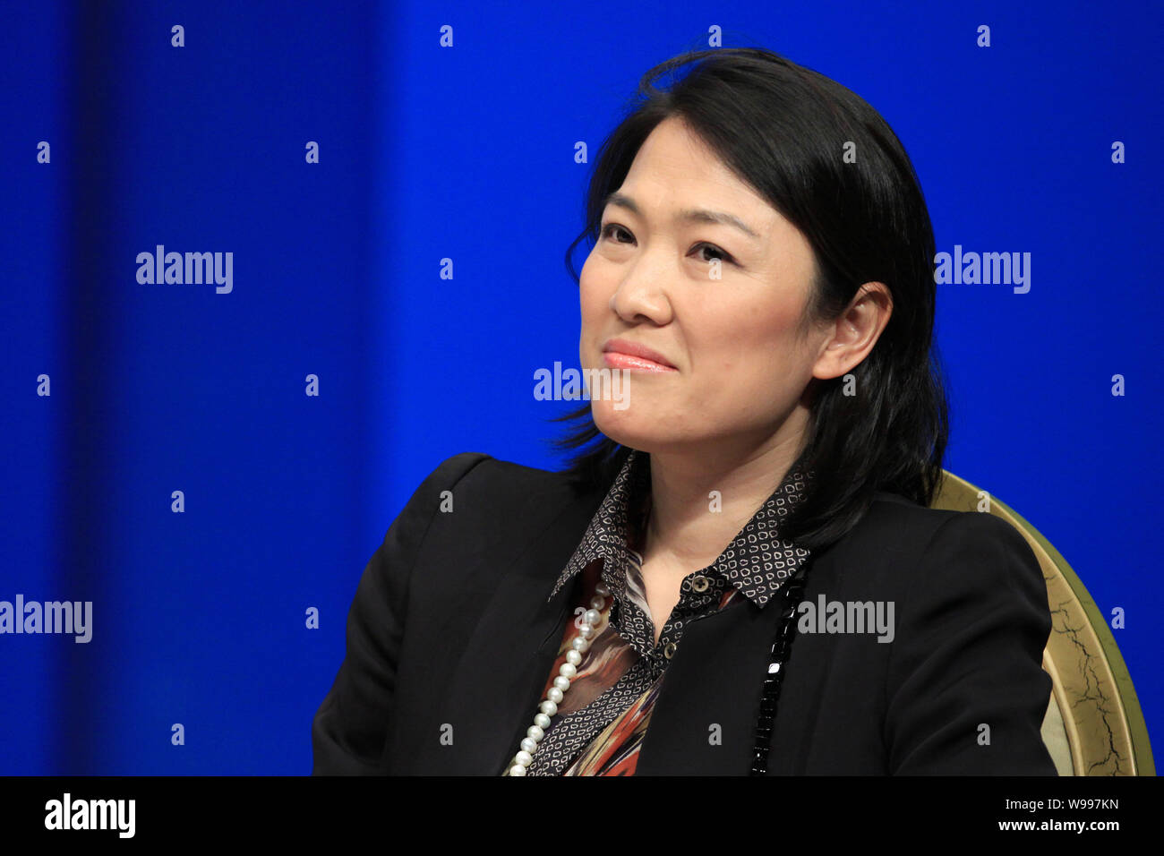 --FILE--Zhang Xin, co-founder and co-CEO of SOHO China, attends a ...