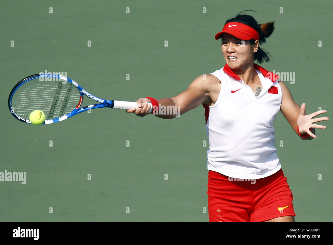 --FILE--Chinas Li Na competes in the womens tennis team final match ...