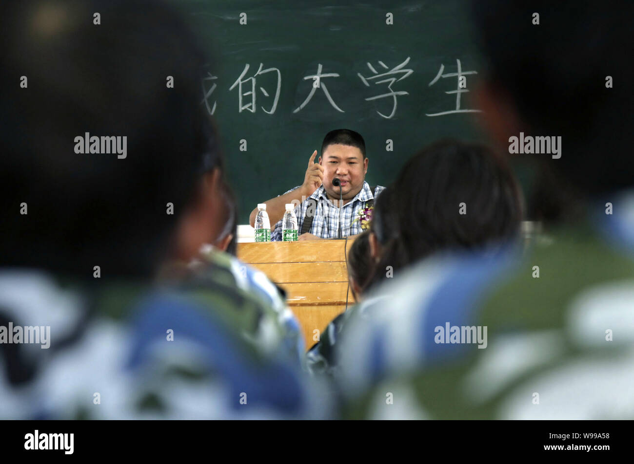Chinese General Mao Xinyu, grandson of Mao Zedong, speaks to young ... Chinese General Mao Xinyu, grandson of Mao Zedong, speaks to young ...
