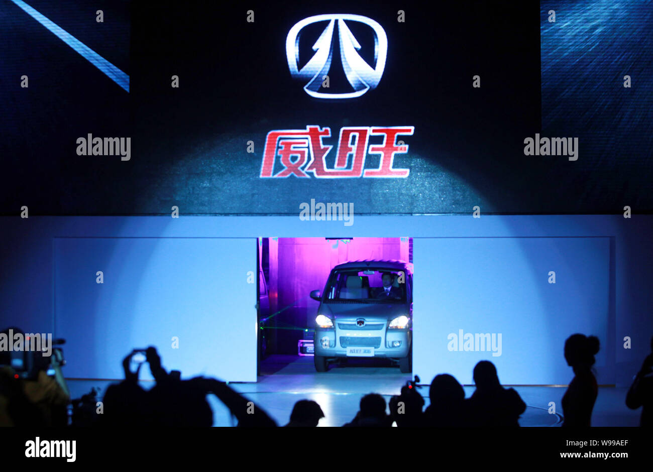 The BAIC Weiwang 306 minivan is pictured during a launch ceremony in ...