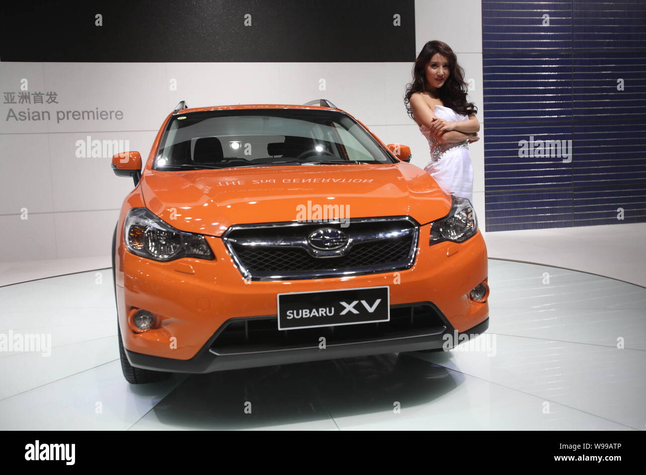 A model poses by a Subaru XV during the 9th China (Guangzhou ...