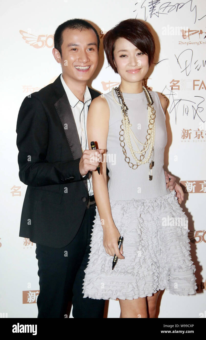 Chinese actor Wen Zhang and his actress wife Ma Yili attend the Chinas ...