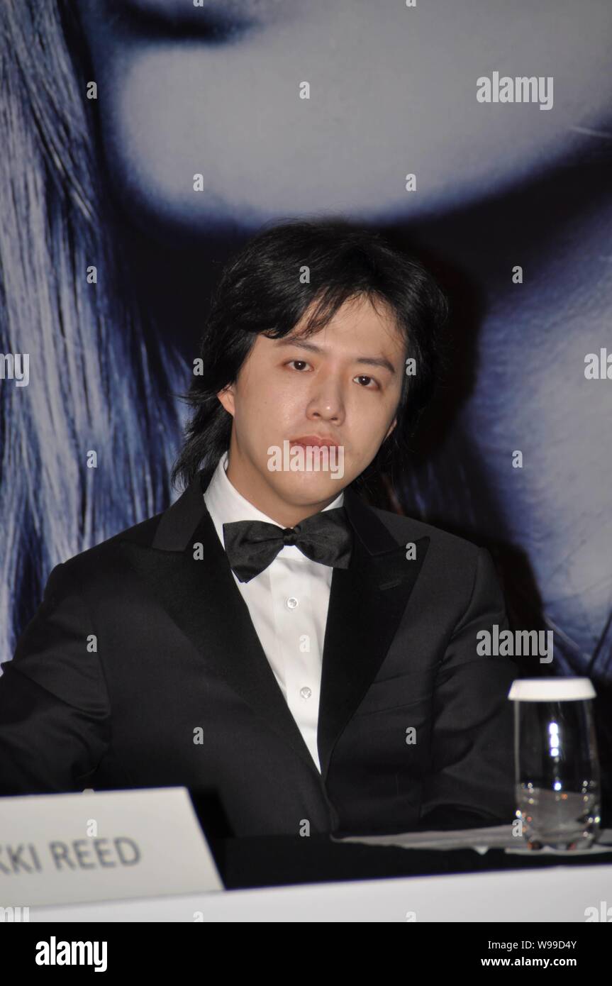 Chinese pianist Li Yundi is pictured during a press conference for ...