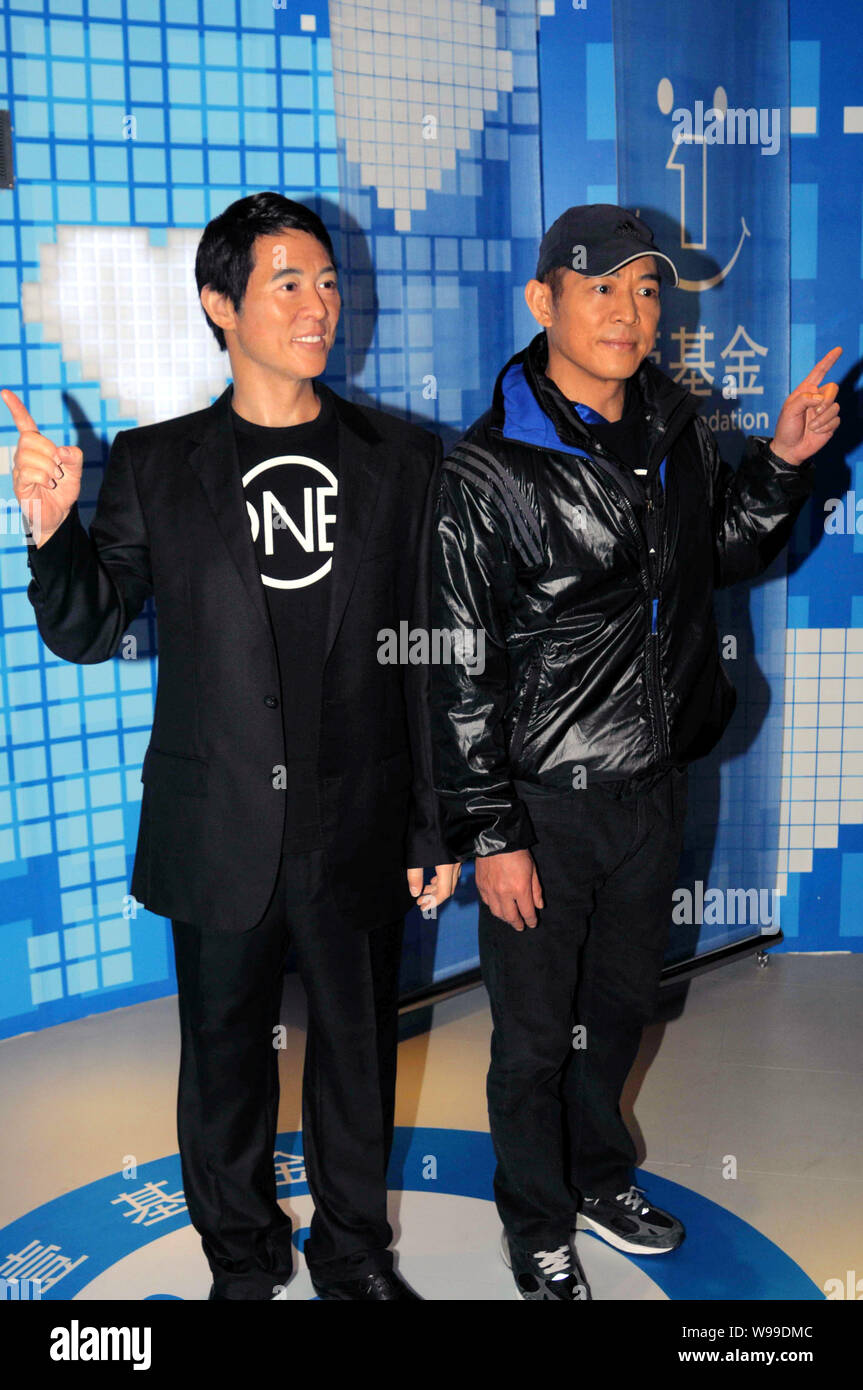 Chinese kungfu star Jet Li (right) poses with his wax figure at the ...