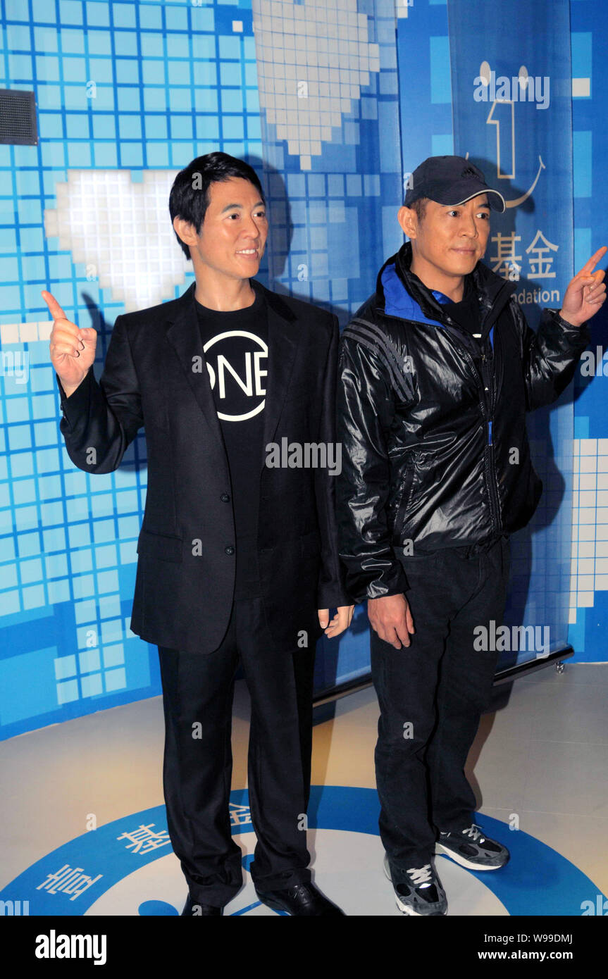 Chinese kungfu star Jet Li (right) poses with his wax figure at the ...