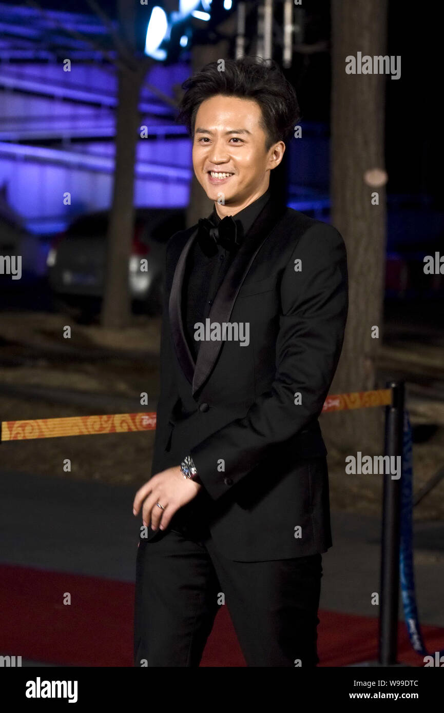 Chinese actor Deng Chao is pictured on the red carpet prior to the Men ...
