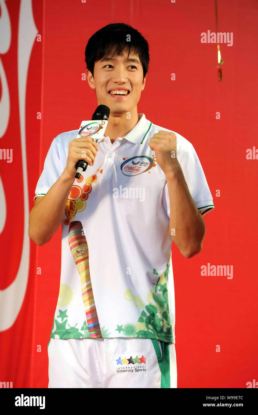 Chinese star hurdler Liu Xiang gestures at the launch ceremony for the ...