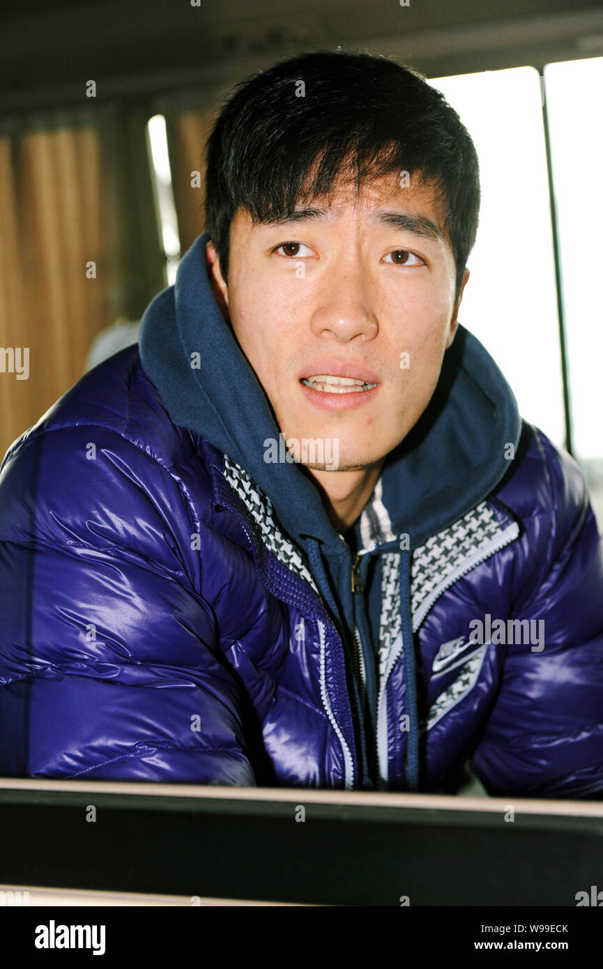 Chinese star hurdler Liu Xiang arrives at the Pudong International ...