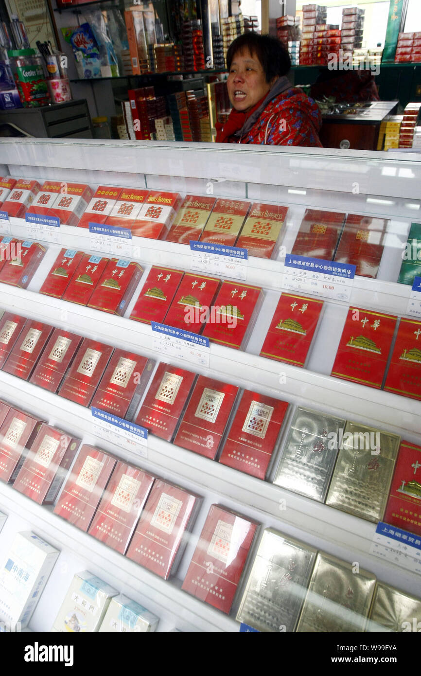 --FILE--Boxes of cigarettes are for sale at a shop in Shanghai, China ...