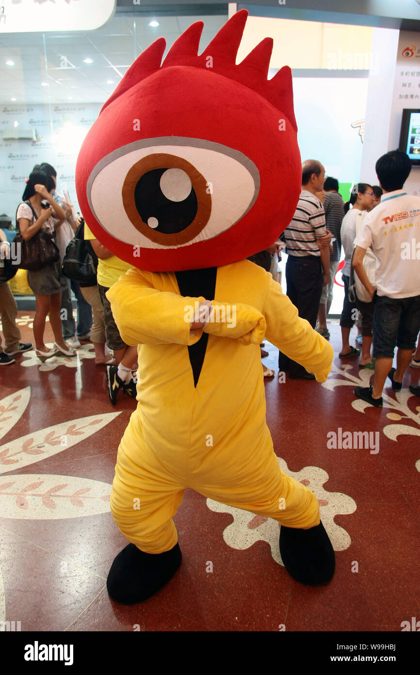 View of a staff dressed in the Sina mascot costume during the Shanghai ...