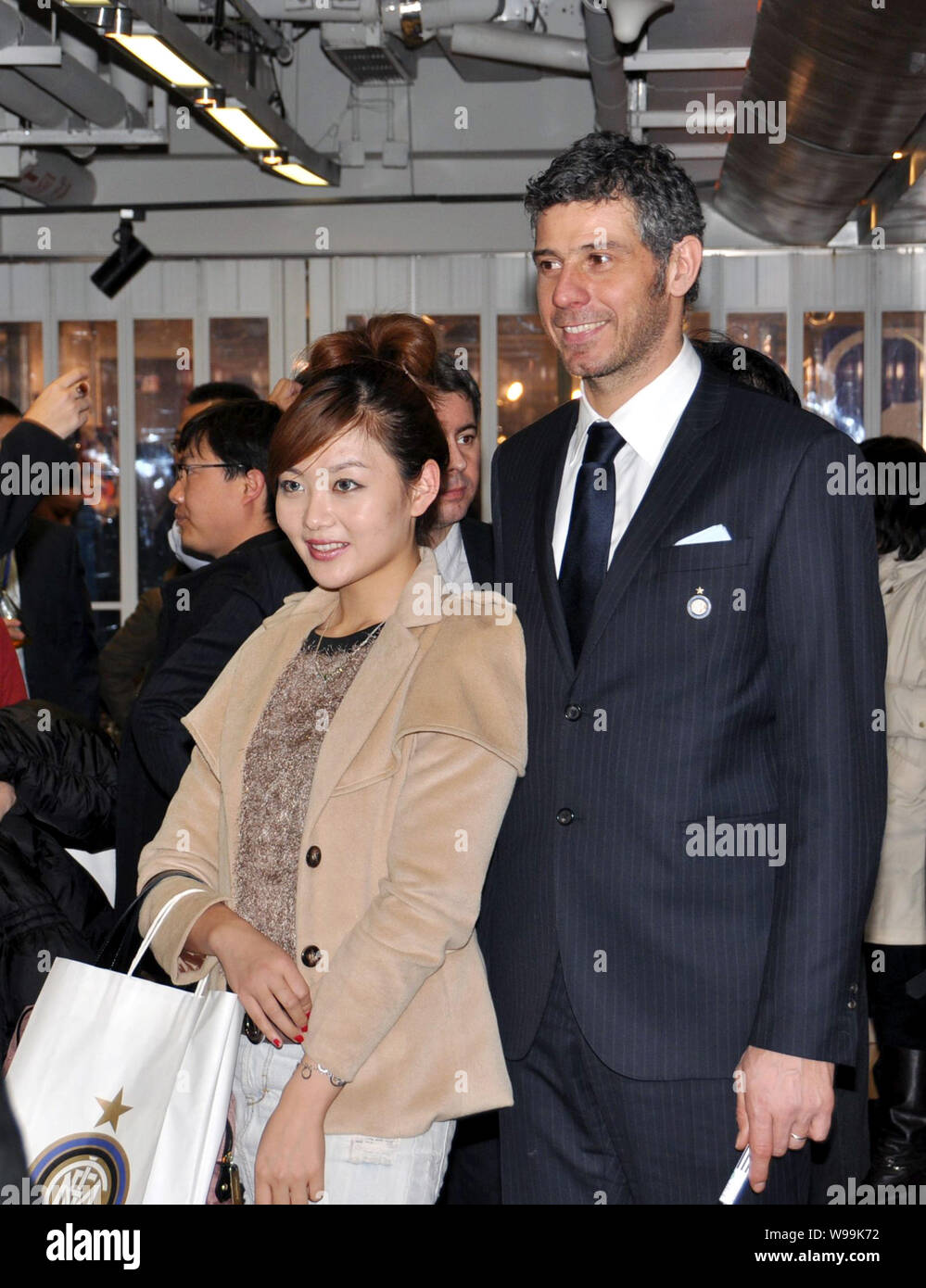 Former Italian goalkeeper Francesco Toldo (right) poses with a young ...