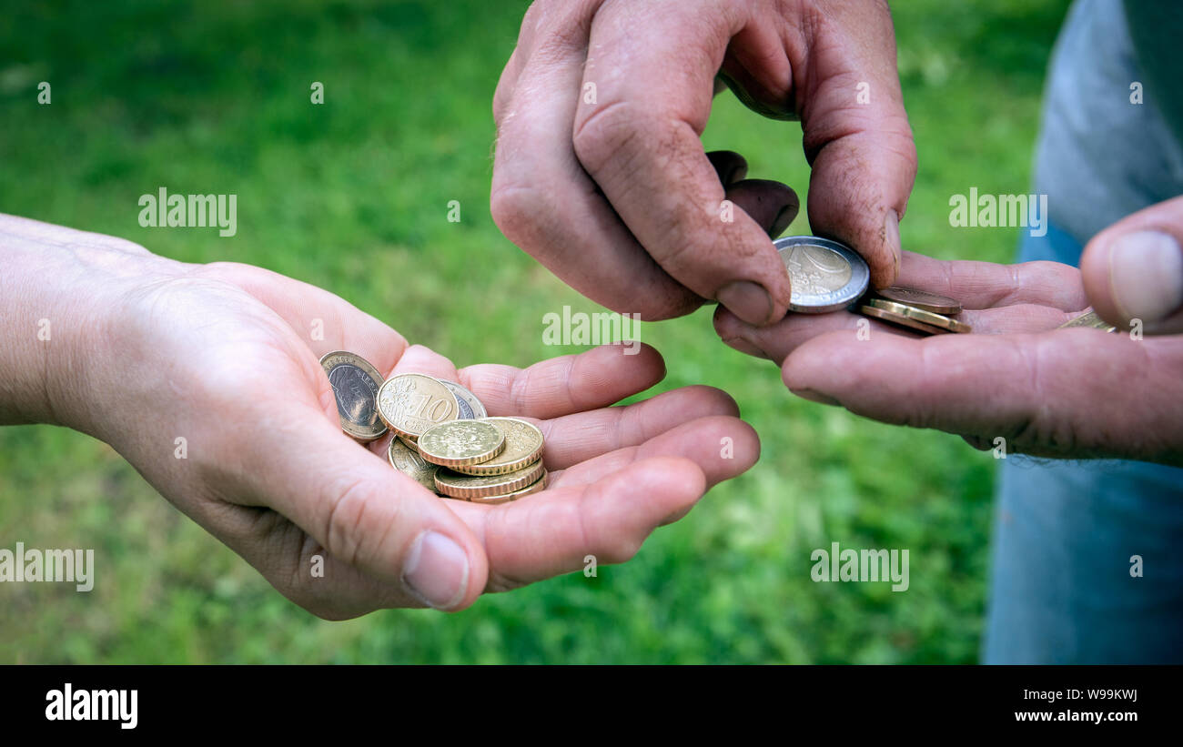 Sharing money hands hi-res stock photography and images - Alamy