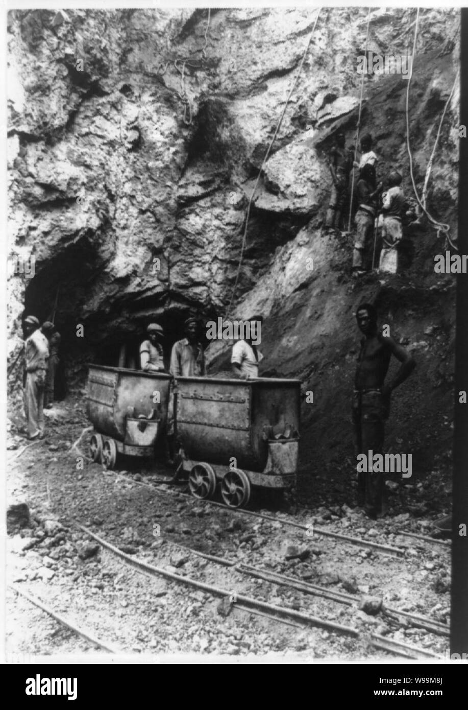 Diamond miners at the bottom of a great shaft at the Wesselton Mines ...