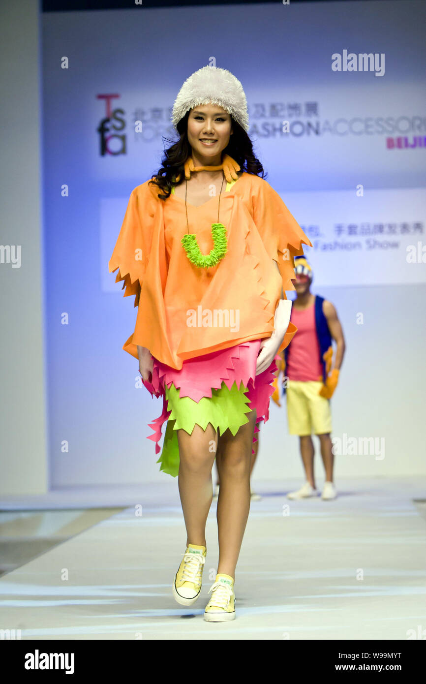 A model parades to show new collections in the Taiwan bags and gloves ...