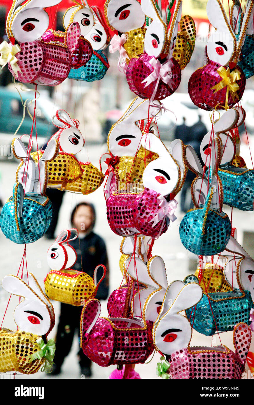 Rabbit-shaped lanterns are seen for sale at a market in preparation for ...