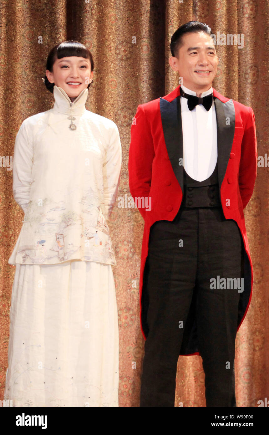 Hong Kong actor Tony Leung Chiu Wai (R) and Chinese actress Zhou Xun ...