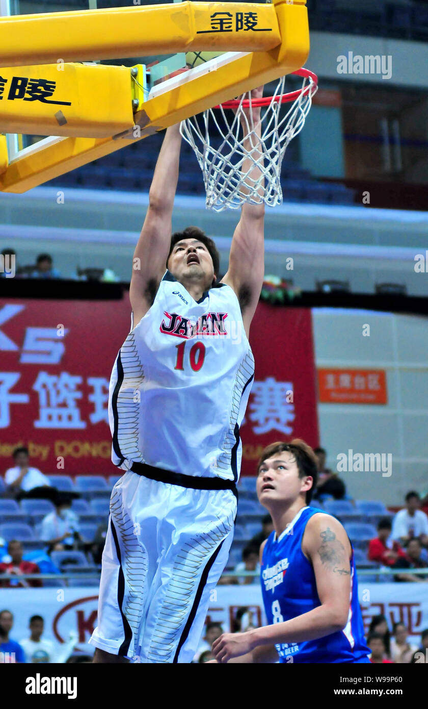 Kosuke Takeuchi of Japan dunks against Chinese Taipei during their ...